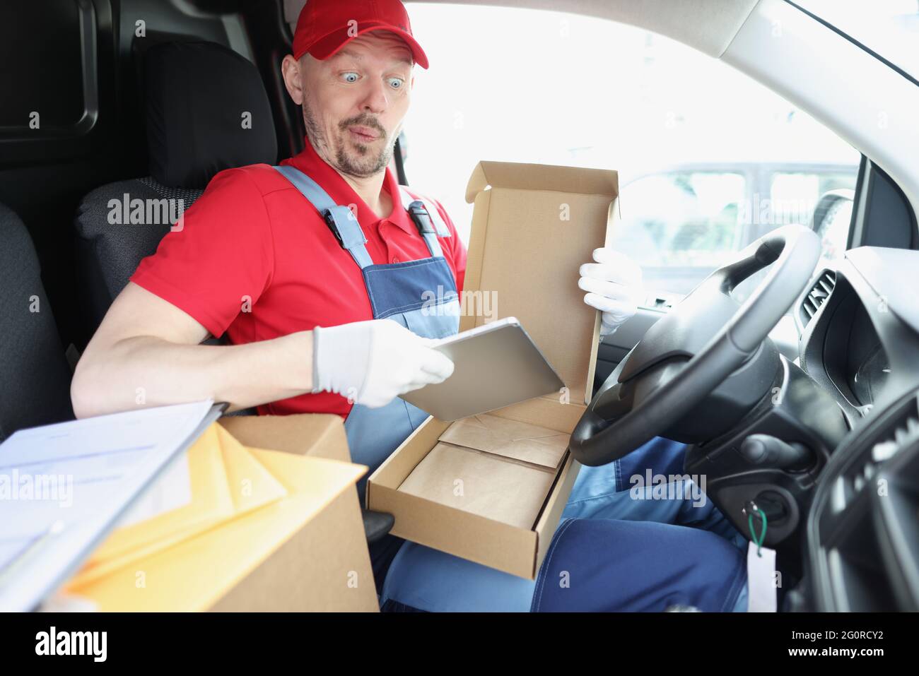 Courier driver hi-res stock photography and images - Alamy