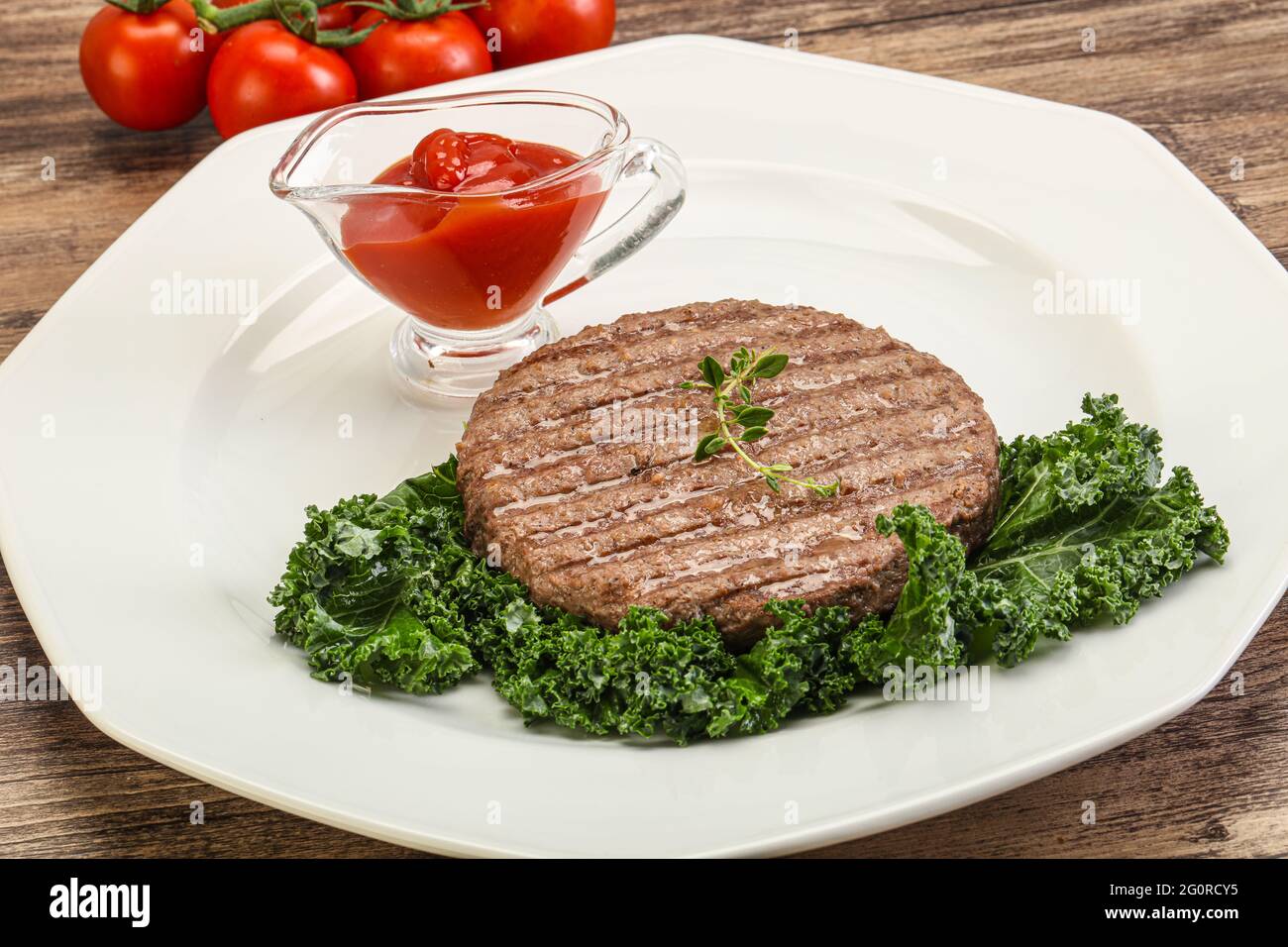 Grilled tasty beef cutlet for burger Stock Photo - Alamy