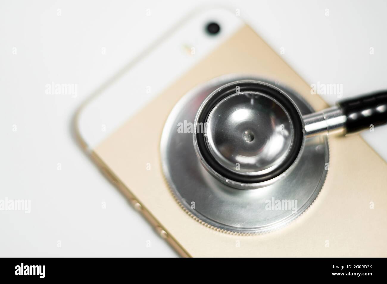 Stethoscope with smart phone. on white, abstract background to solution ...