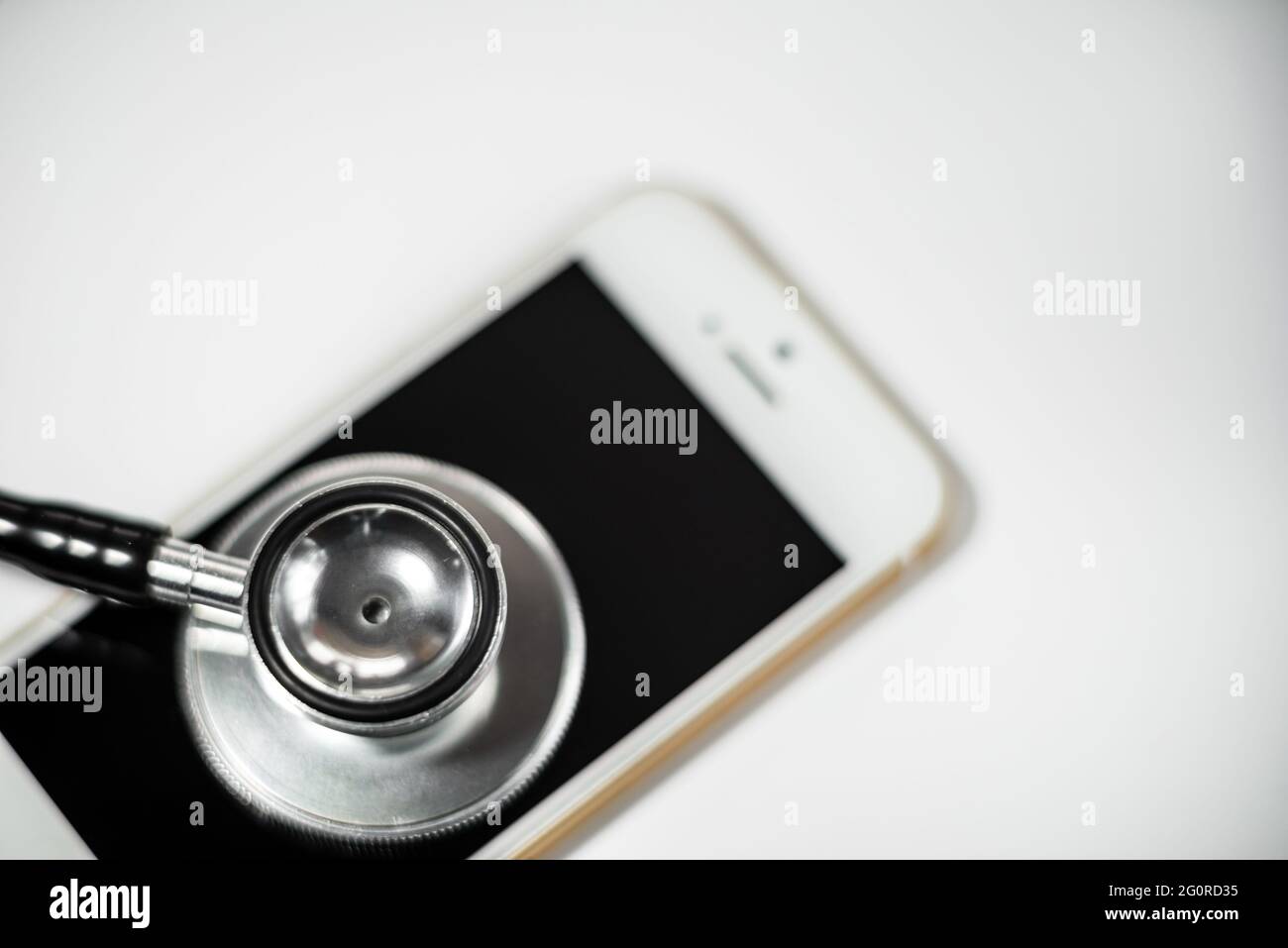 Stethoscope with smart phone. on white, abstract background to solution ...