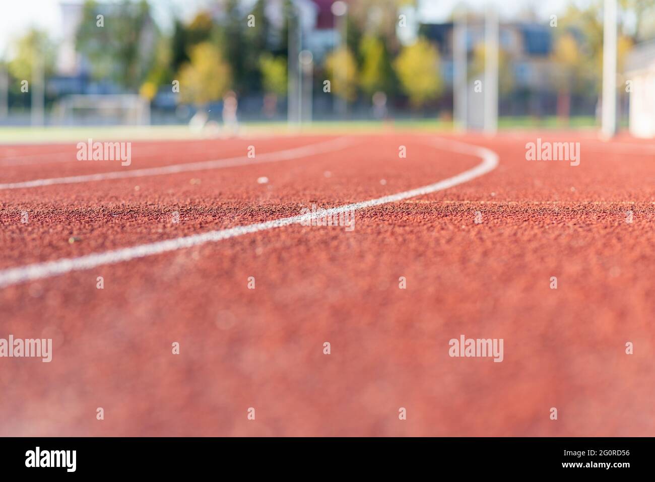 Red plastic track in the outdoor track and field stadium.Closeup Stock ...