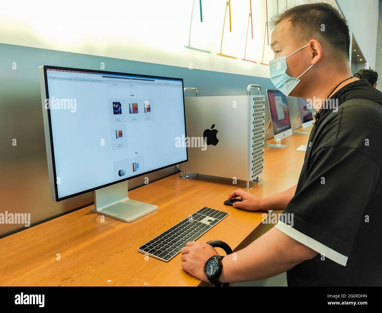 SHANGHAI, CHINA - JUNE 3, 2021 - A customer looks at a Mac Pro ...