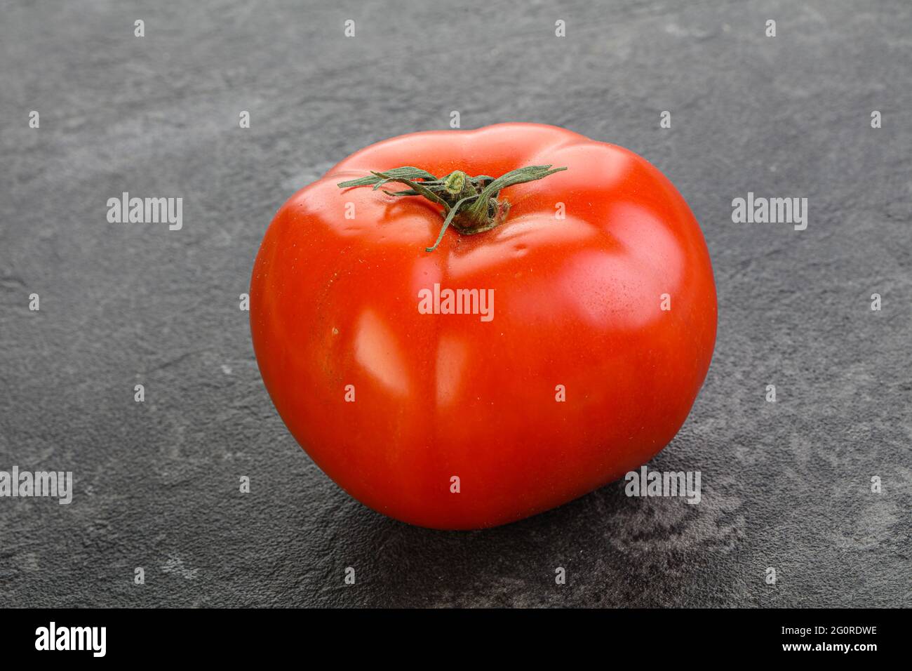 Red ripe big juicy tomato isolated Stock Photo - Alamy