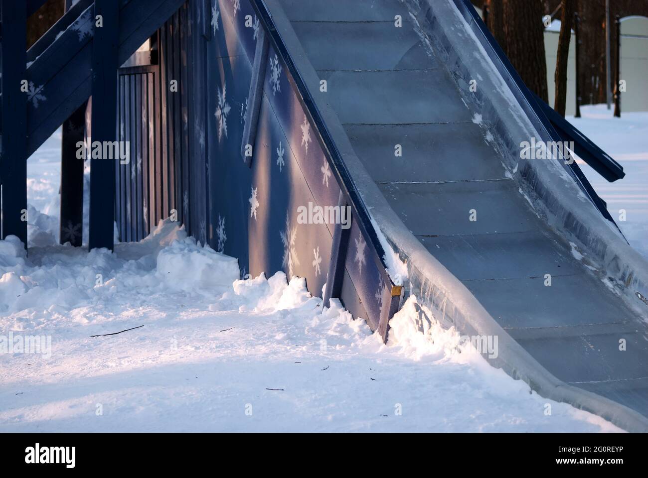 children's wooden slide with ice, in winter Stock Photo - Alamy