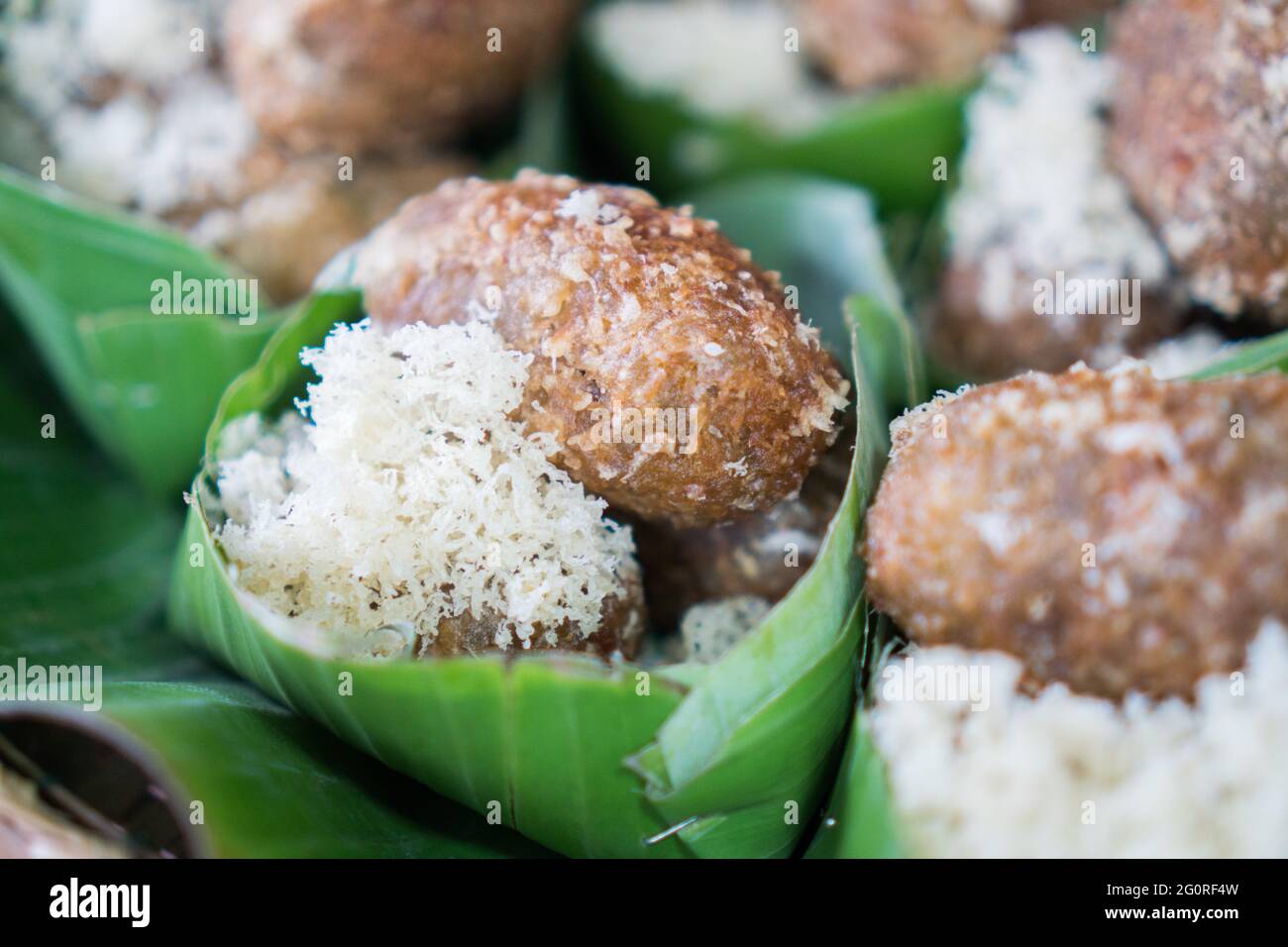 Traditional Thai old fashioned dessert, deep-fried unripe rice grain ...