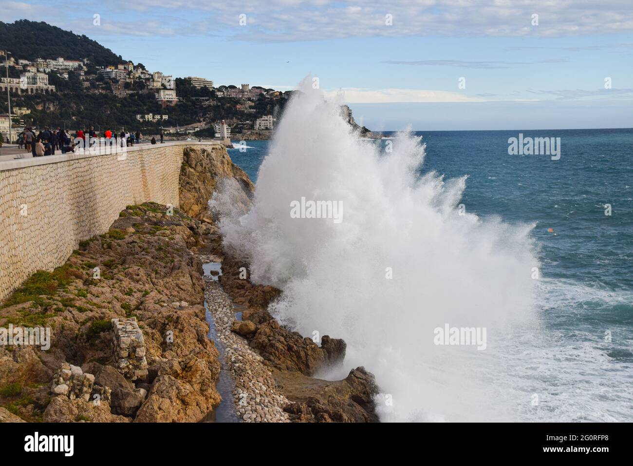Nice, France. 3rd November 2019. Waves crash against the rocks and ...