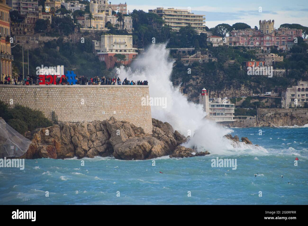 Nice, France. 3rd November 2019. Waves crash against the rocks and ...