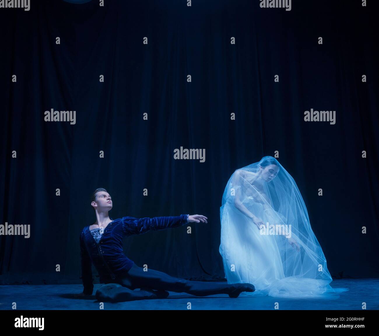 Graceful balerina in image of ghost bride with patner in art ballet ...