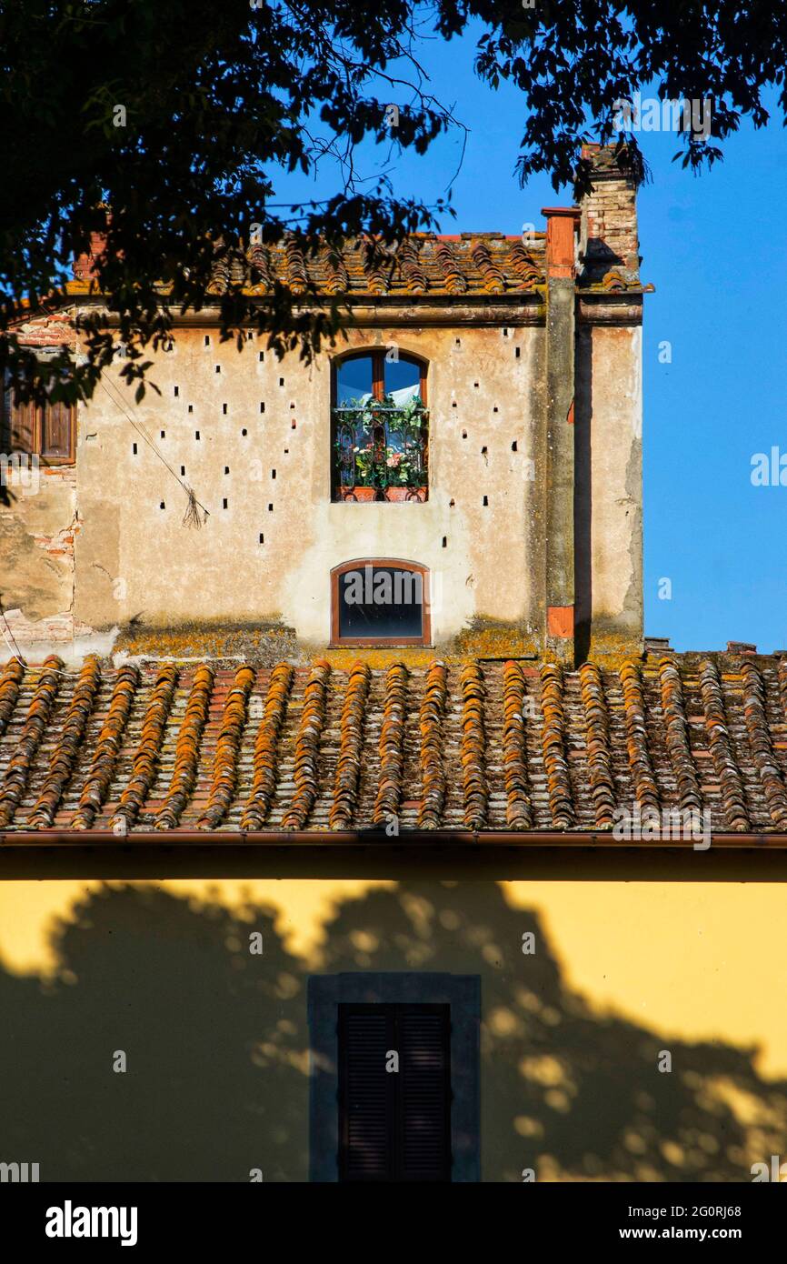 colored facades of ancient buildings in the historic center Stock Photo ...