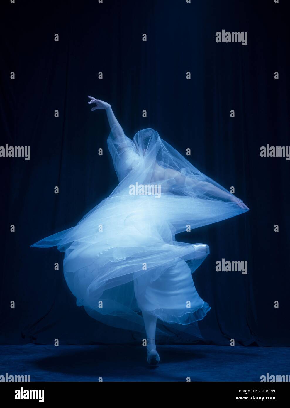 Loneliness. Young graceful beautiful woman, balerina in white wedding ...