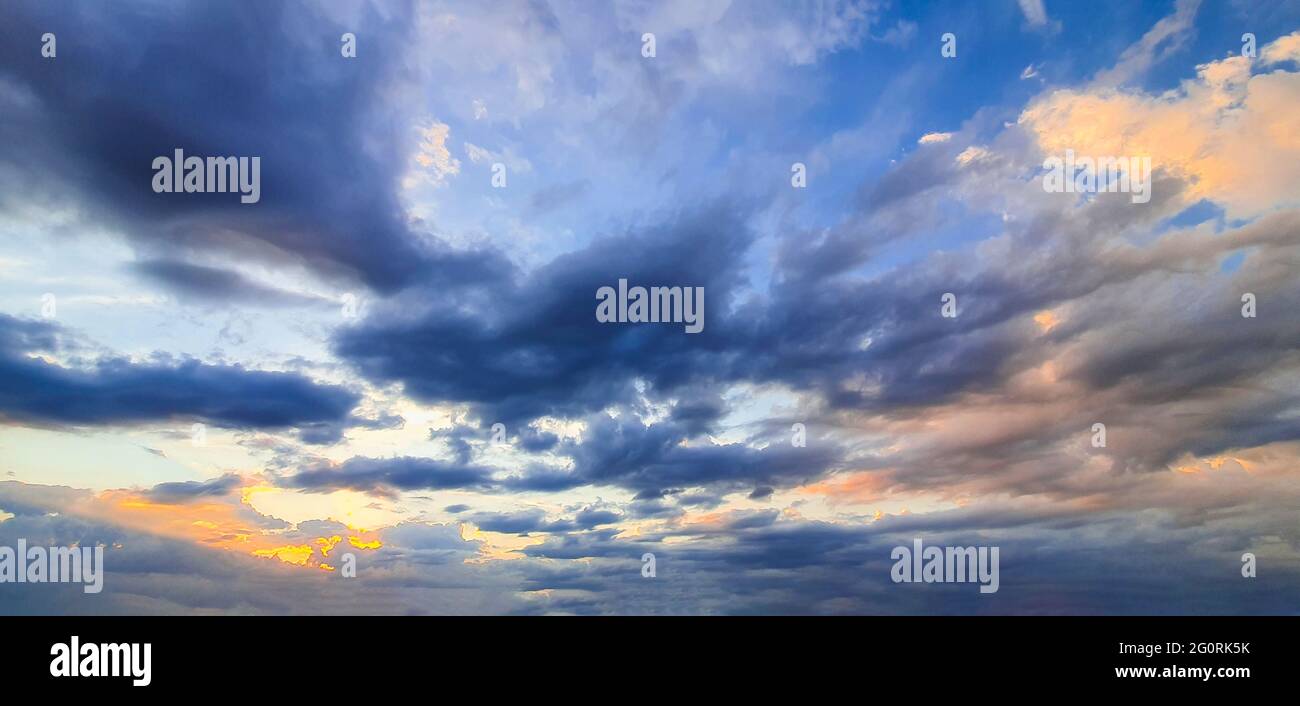 Cloudy dark color sky at sunset after summer rain Stock Photo - Alamy