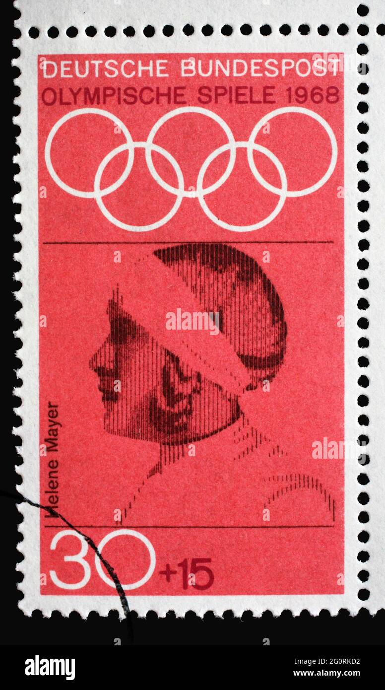 Stamp printed in Germany showing portrait of Helene Mayer, fencer, 1968 ...