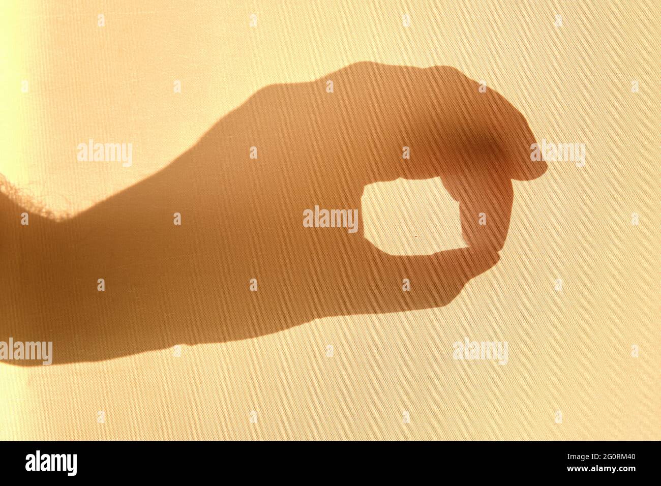 Hand silhouette with ok gesture, shadow of male palm Stock Photo - Alamy