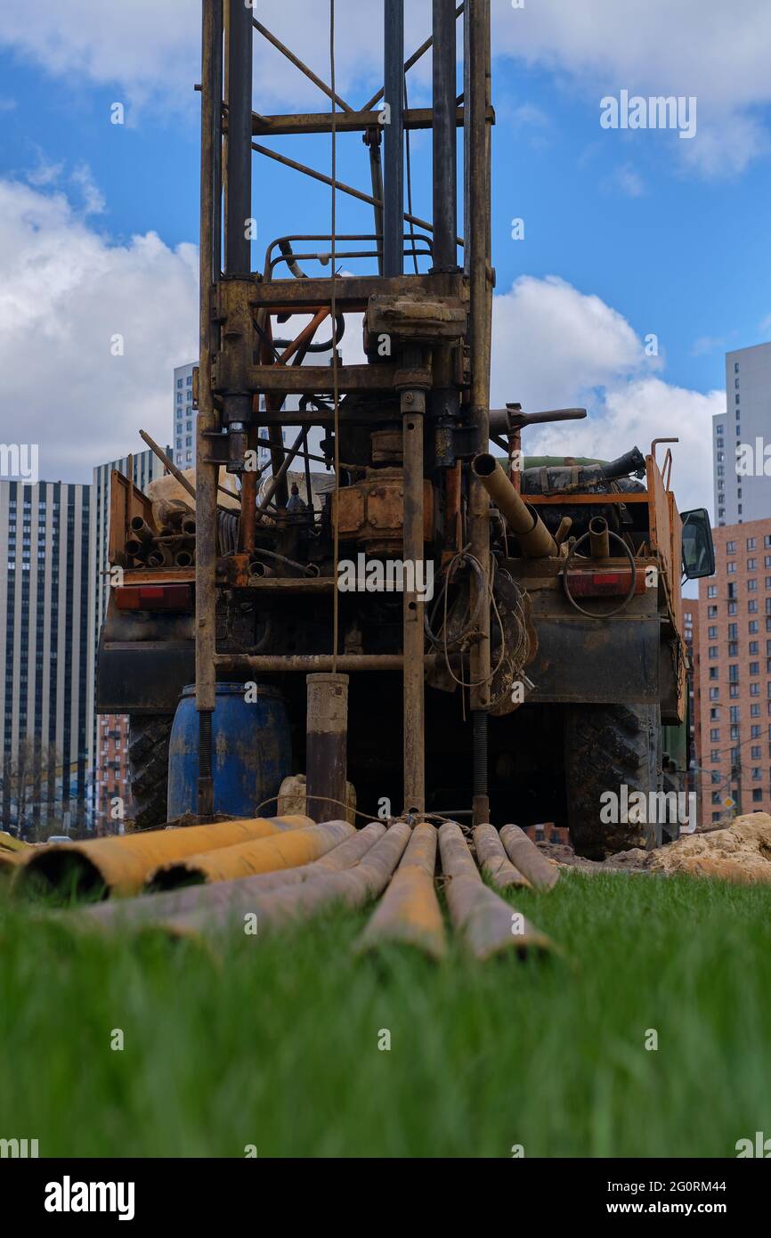 Drilling of soil for taking soil samples for analysis in geological ...