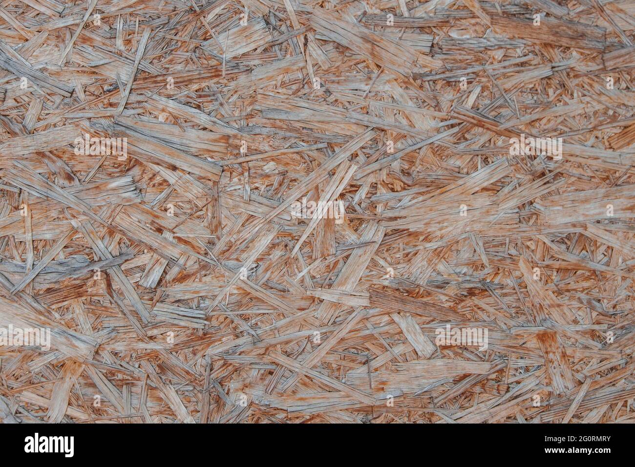 Old scuffed surface of water-resistant osb board close-up. Background ...
