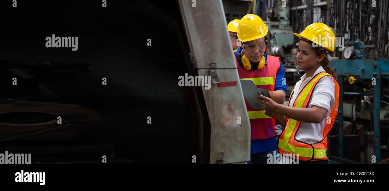 Heavy industrial worker is working on metal work factory, Machine for ...