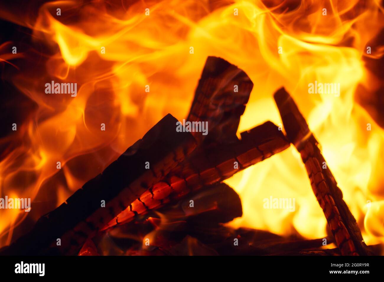 A fire burns in a fireplace, Fire to keep warm Stock Photo - Alamy