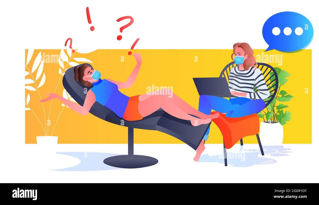 two girls in medical masks discussing during meeting friendship ...