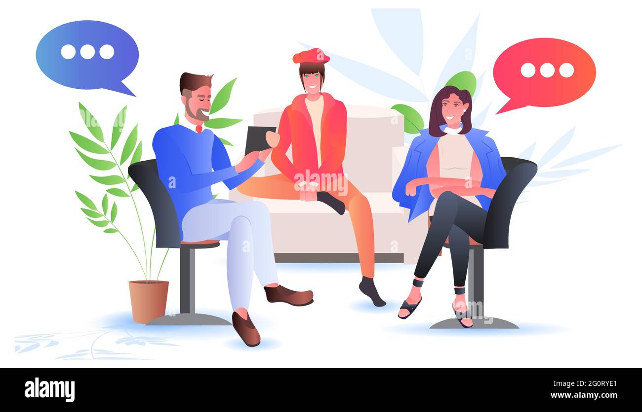 friends discussing during meeting at round table chat bubble ...