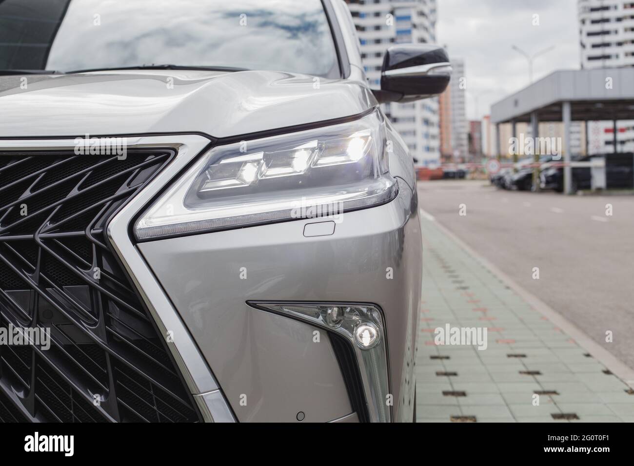 Car's exterior details. shiny headlights on a car Stock Photo - Alamy