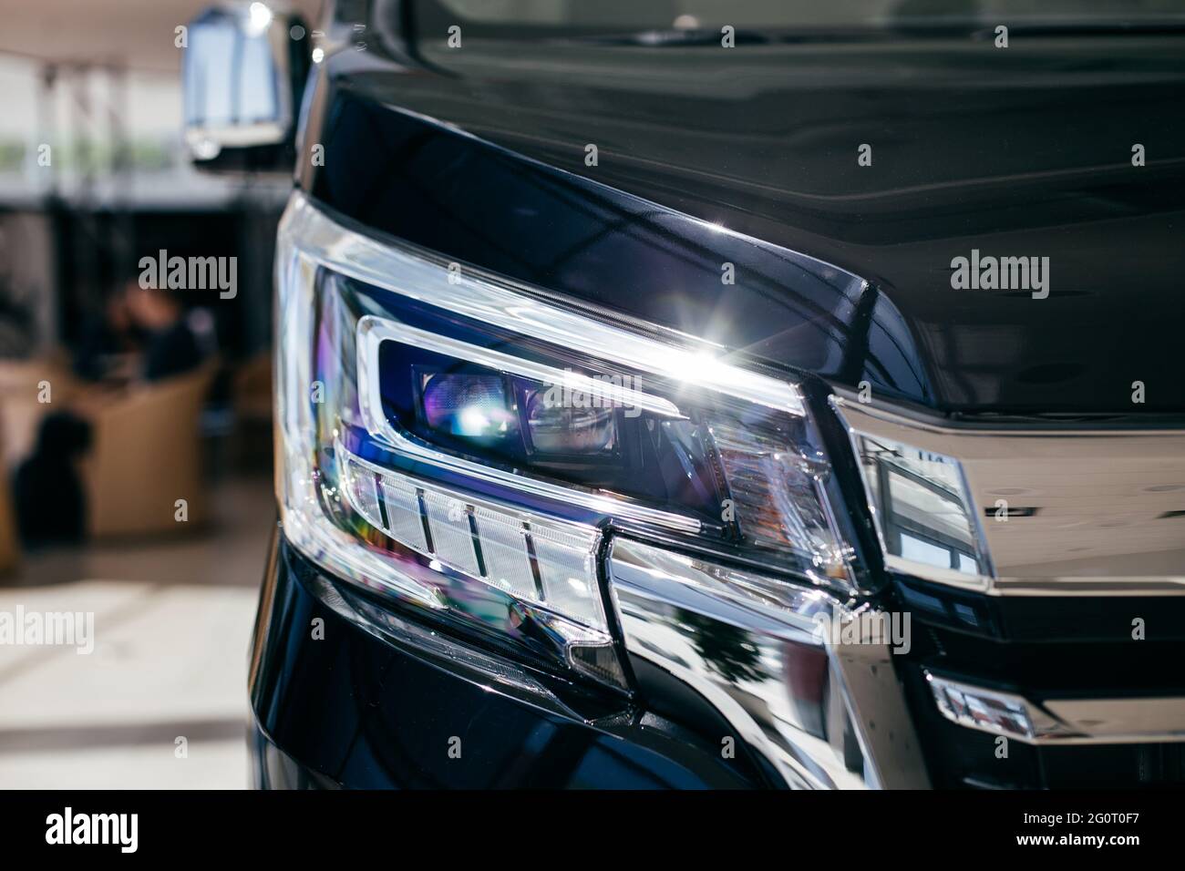Car's exterior details. shiny headlights on a car Stock Photo - Alamy