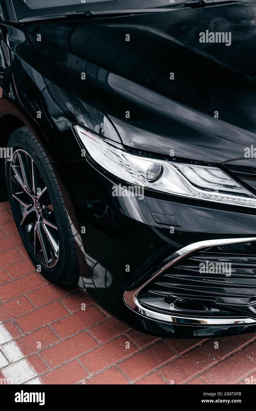 Car's exterior details. shiny headlights on a car Stock Photo - Alamy