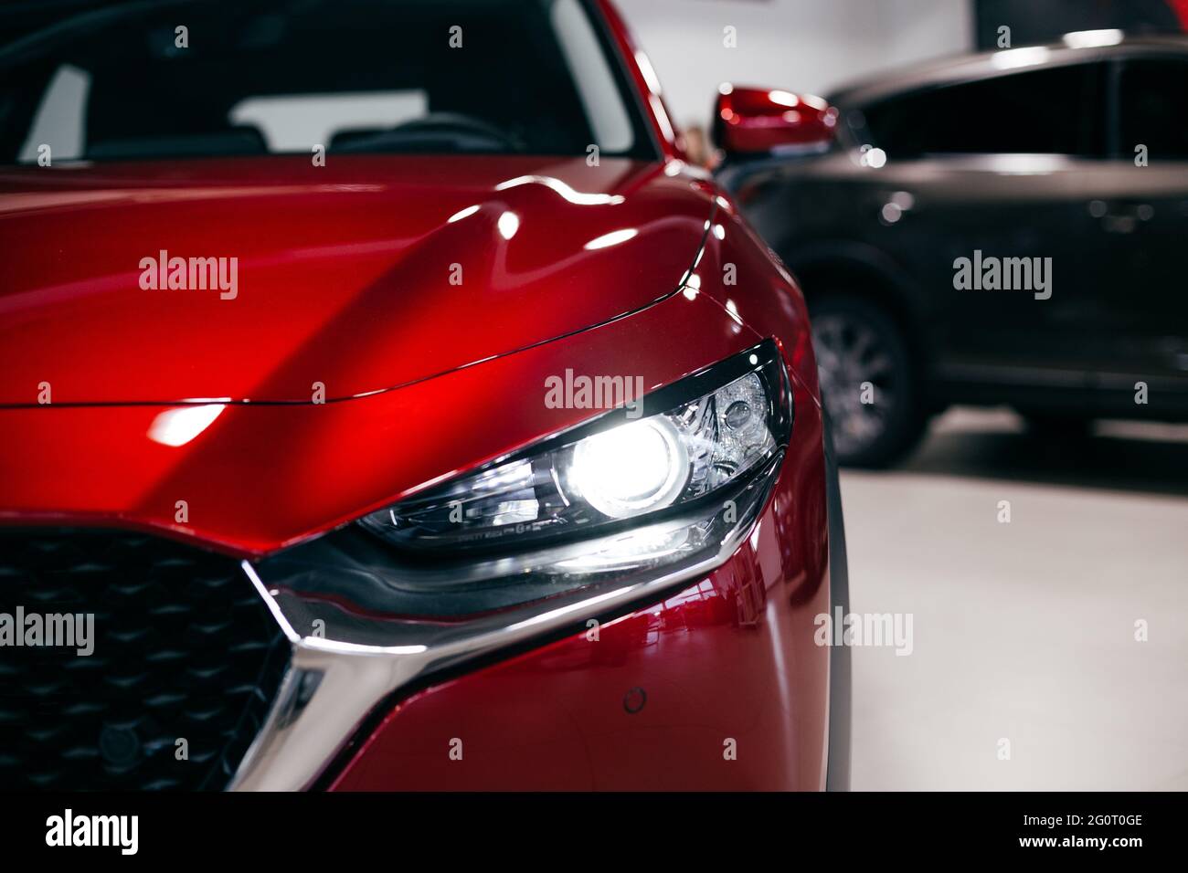 red car headlight close up, beautiful car design Stock Photo - Alamy