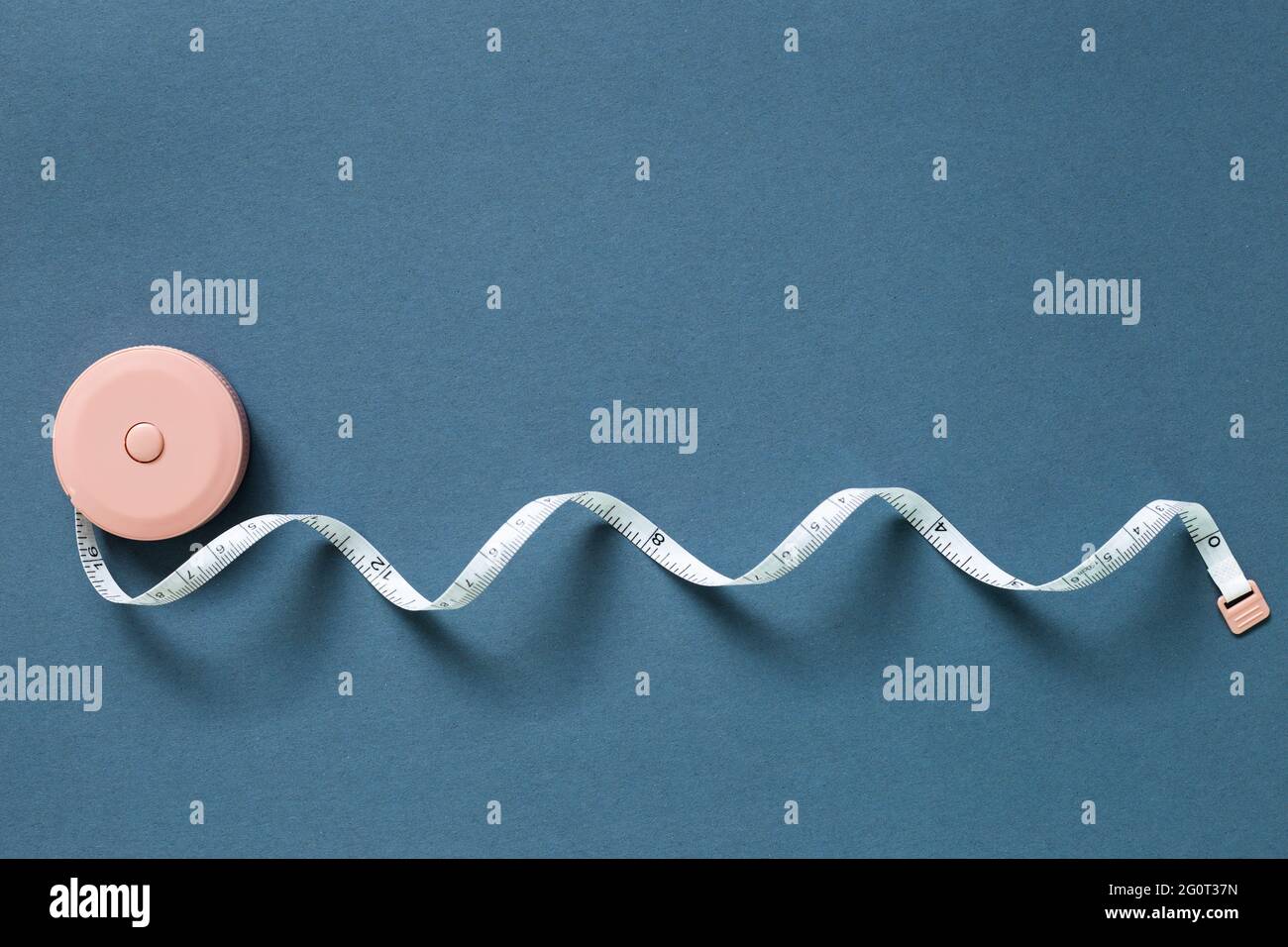 Rolled tape measure space hi-res stock photography and images - Alamy