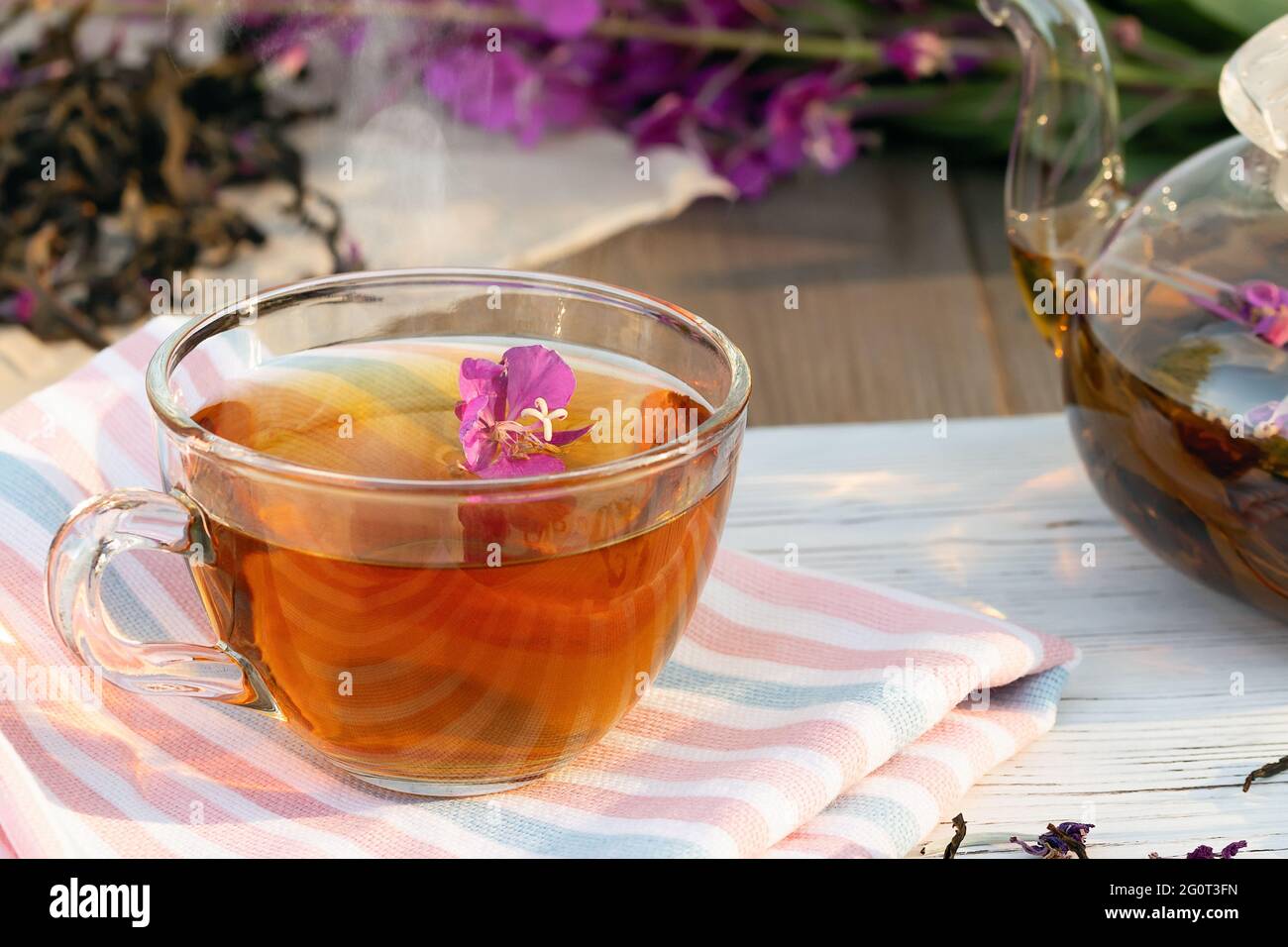 Herbal tea made from fireweed known as blooming sally in teapot and cup ...