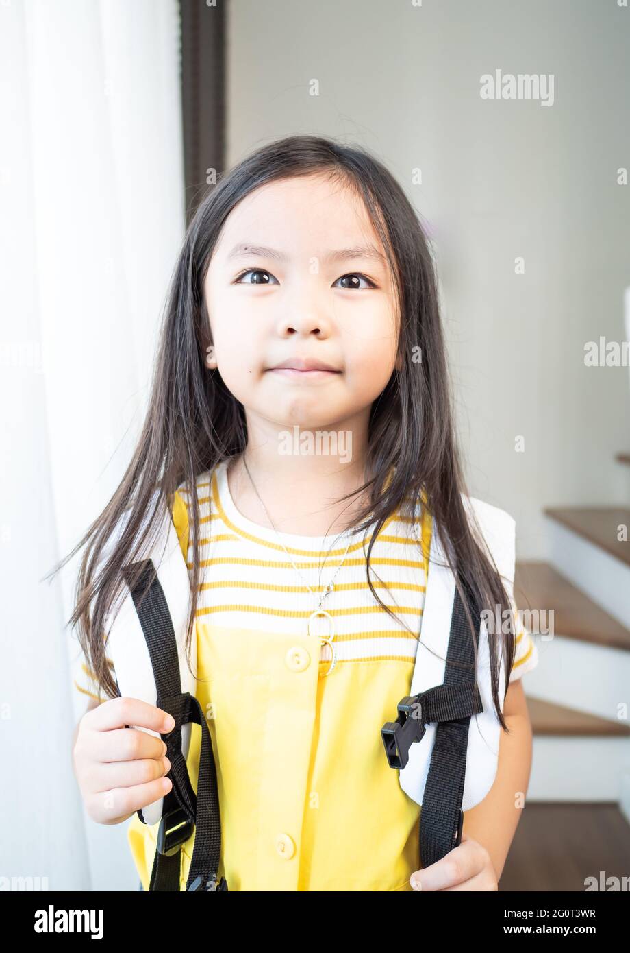 Happy Asian children carry backpacks. back to school concept Stock ...