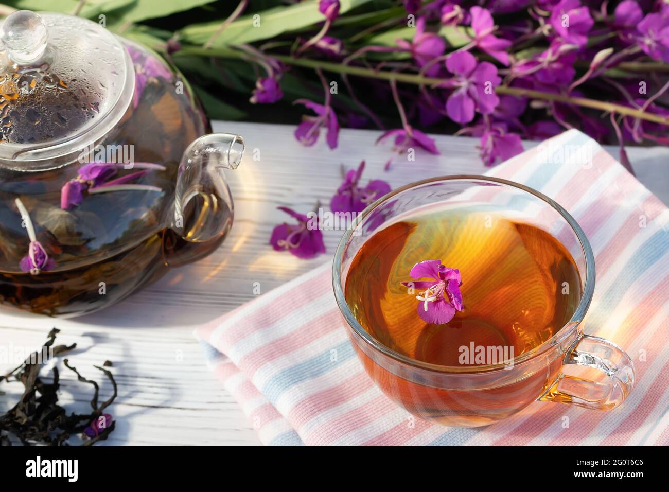 Herbal tea made from fireweed known as blooming sally in teapot and cup ...
