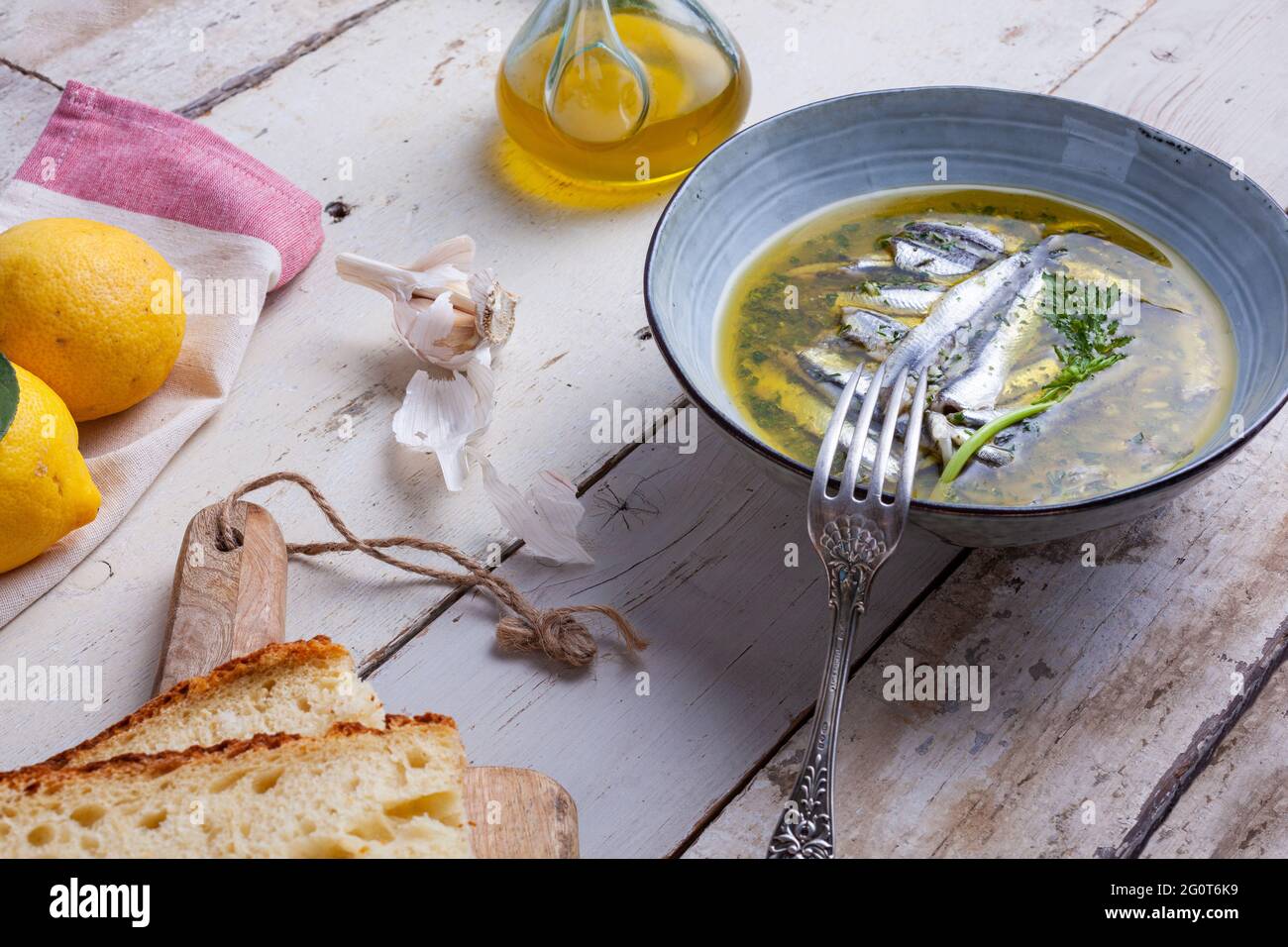 Marinated anchovies in lemon juice with olive oil garlic and parsley ...