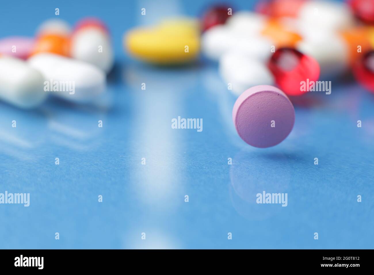 Colorful of tablets and capsules pill in blister packaging arranged ...