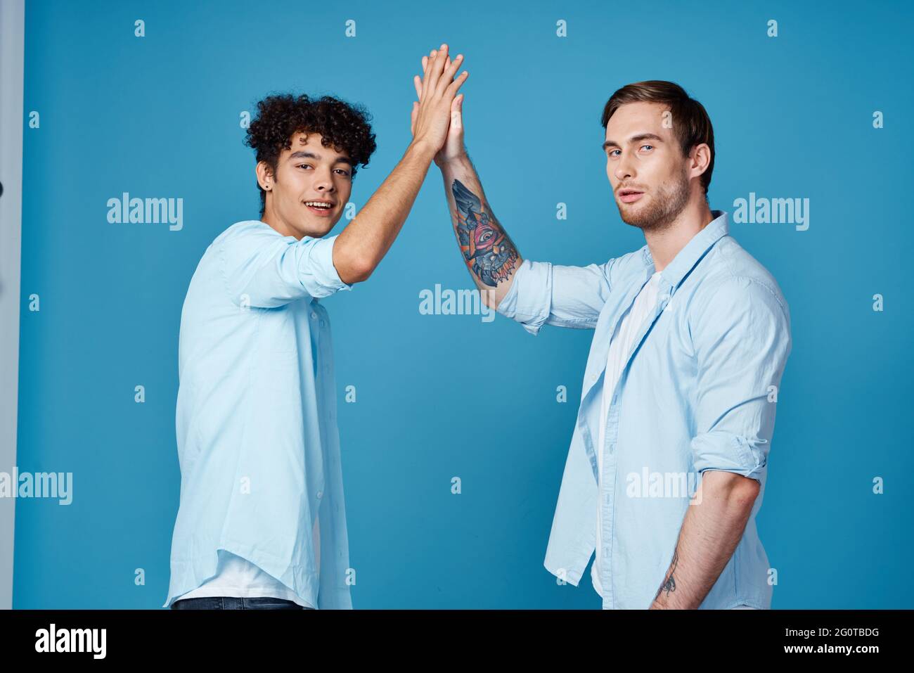 young guys in matching t-shirts and shirts fun greetings blue ...