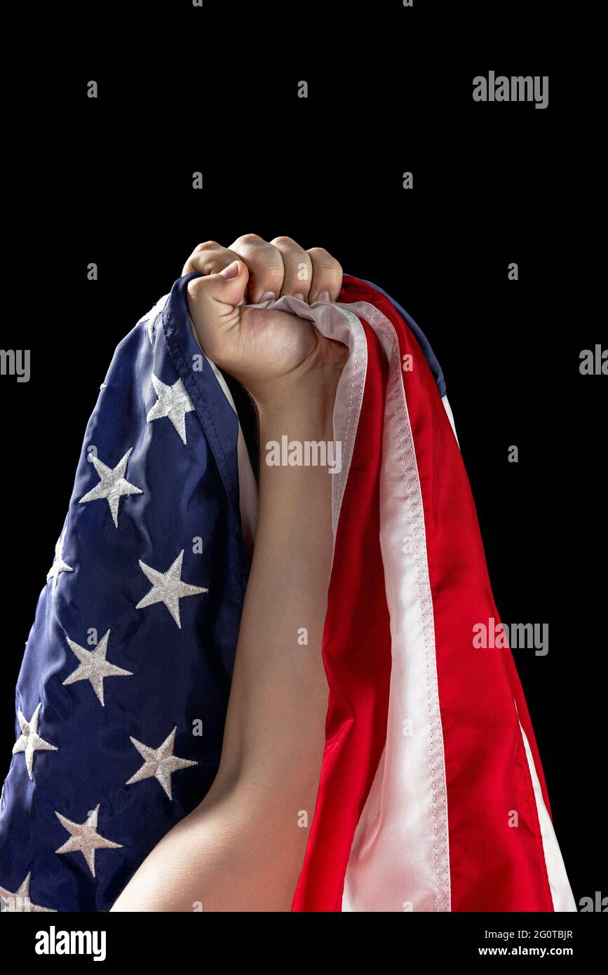 Human hand holding national American flag. USA Memorial Day, Labour Day ...