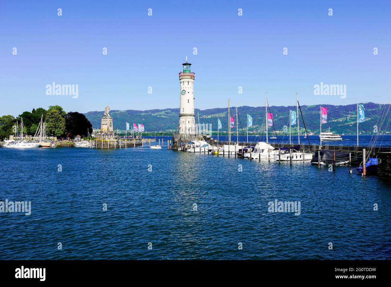 Flags and old lighthouse hi-res stock photography and images - Alamy