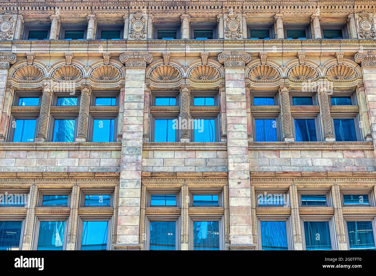 Colonial-style architecture (1898) in the stone facade of a building ...