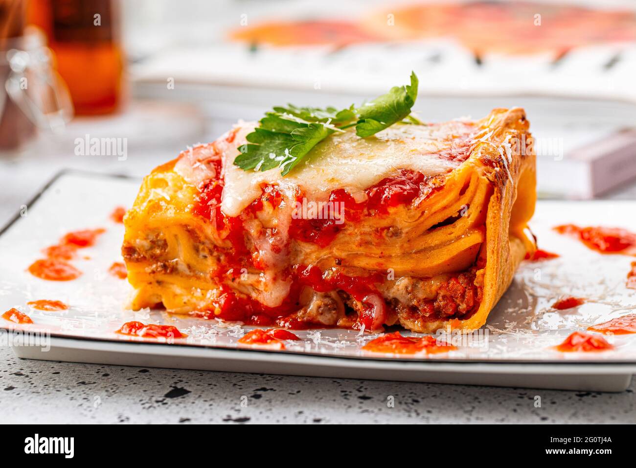 Side view on italian lasagna dish Stock Photo - Alamy