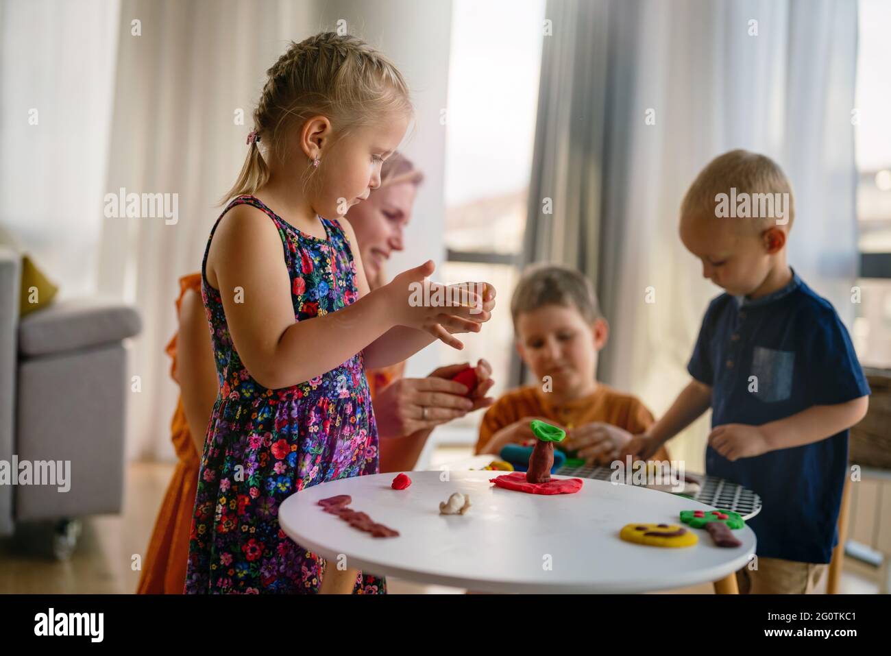 Nursery teacher and children hi-res stock photography and images - Alamy