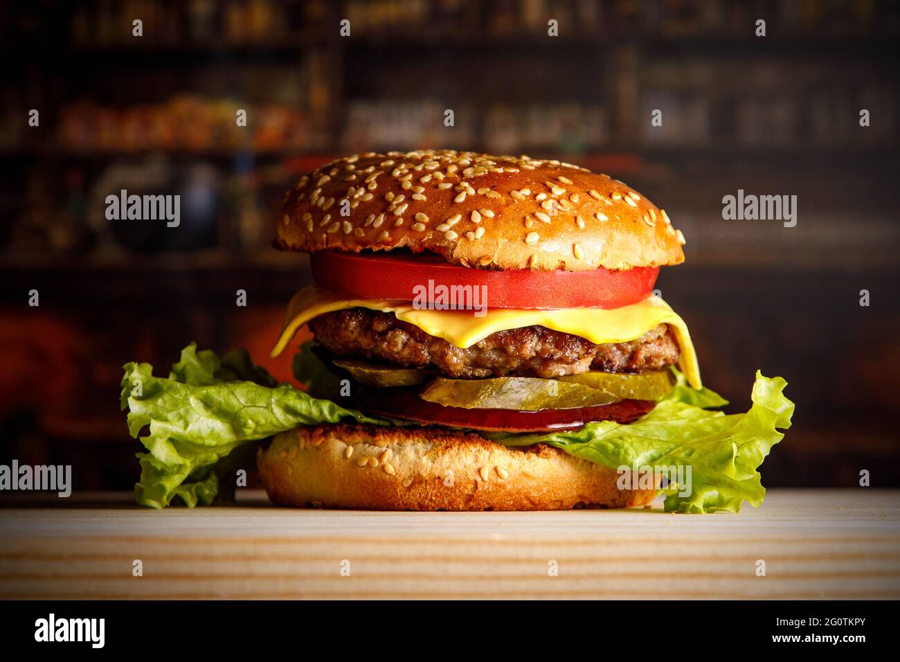 Classic burger in a bar Stock Photo - Alamy