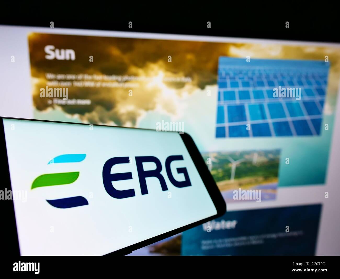 Smartphone with logo of Italian energy company ERG S.p.A. on screen in ...