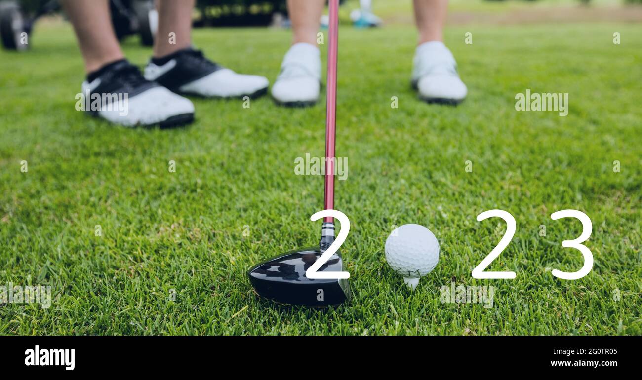 Composition of 2023 number with golf ball and golf club on golf course ...