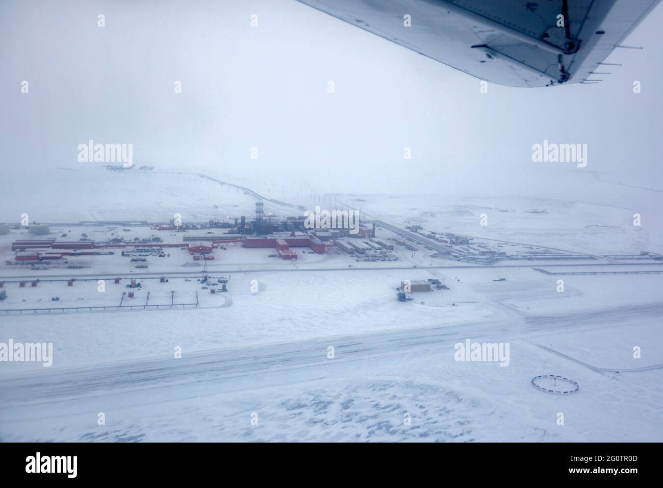 Oil pipeline and iceroad leading from the ConocoPhillips oilwells in ...