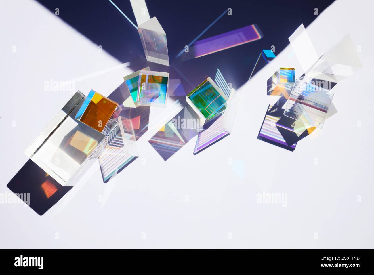 Abstract Background With Glass Geometric Figures Prisms With Light Diffraction Of Spectrum