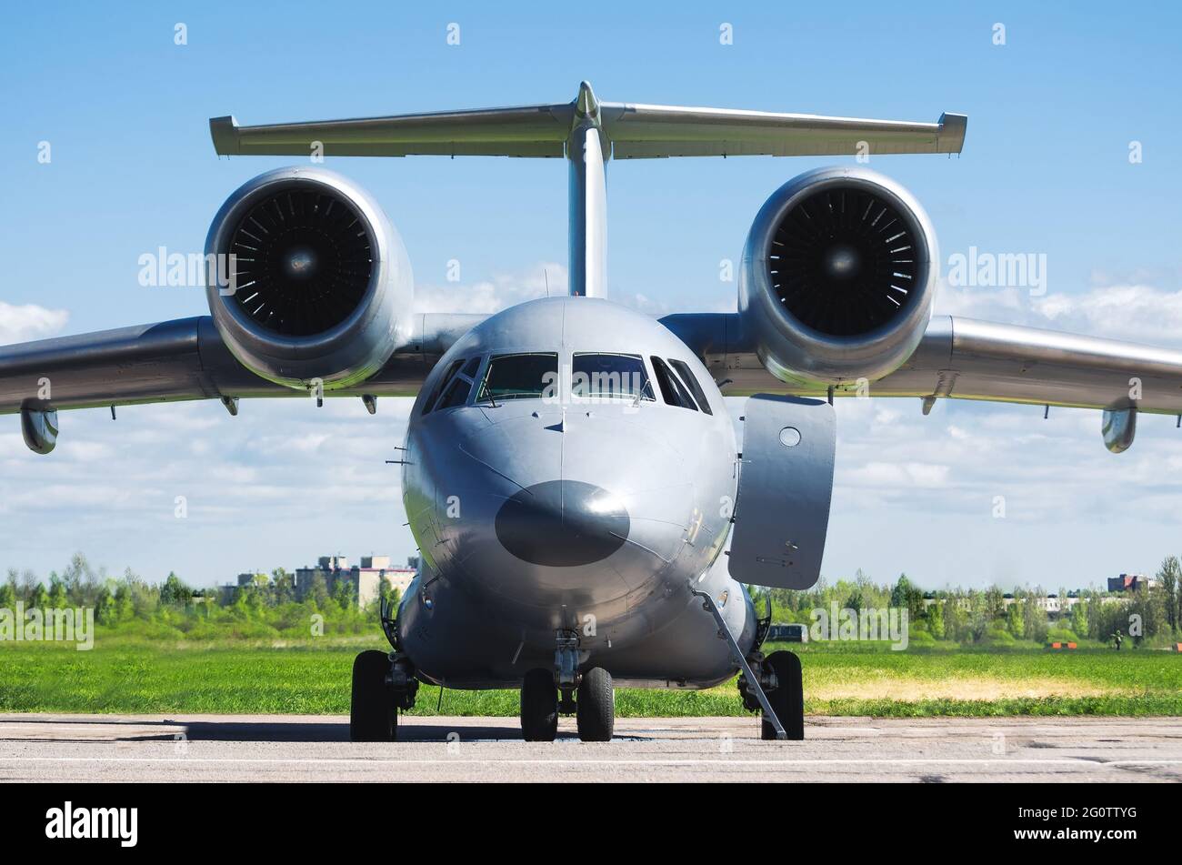 Gray Airplane with engines on the wings parked in the parking lot at ...