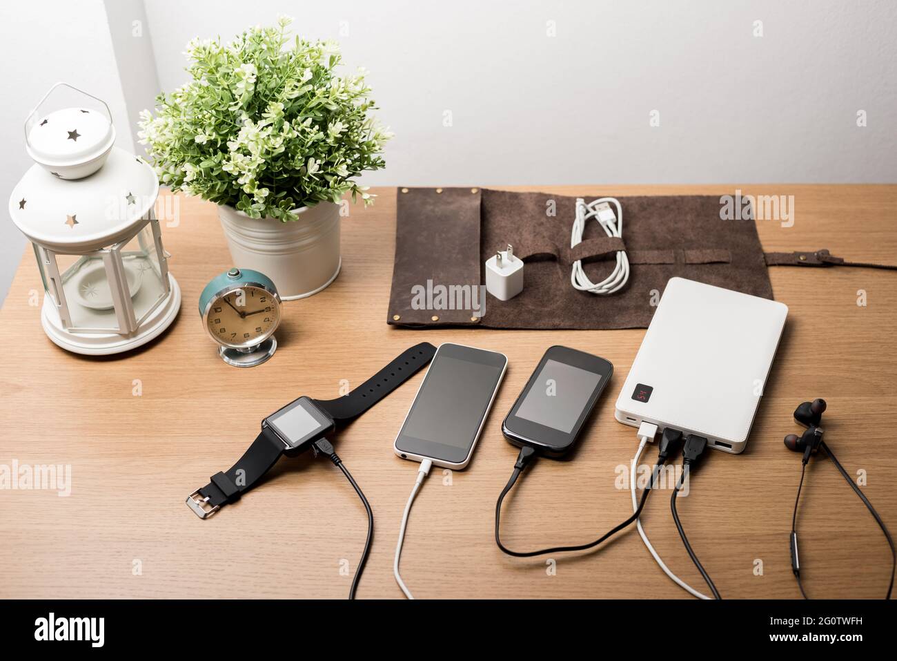 Charging the empty battery smartphone with white power bank Stock Photo ...