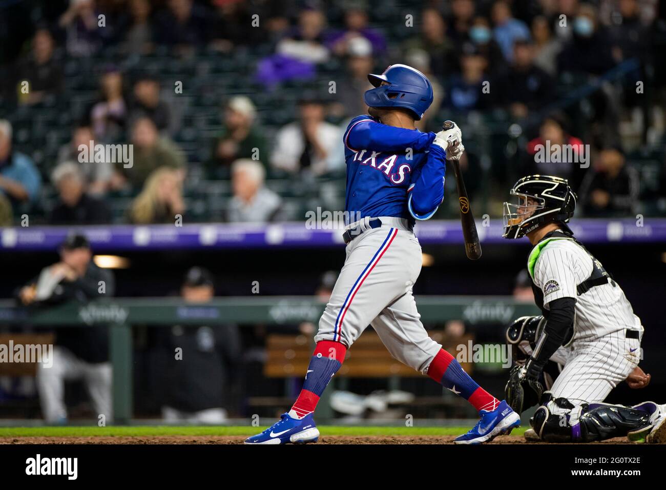 Texas Rangers outfielder Khris Davis (4) hits a home run during an MLB ...