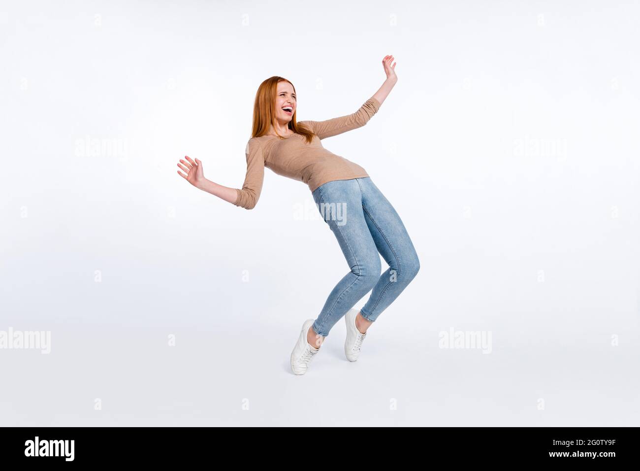 Full length photo of shiny funky ginger lady wear beige shirt smiling ...