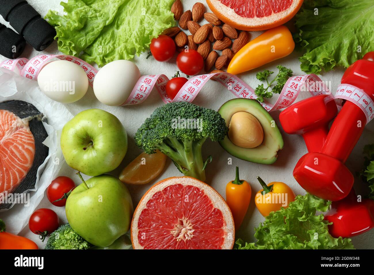 Healthy nutrition concept on white textured background, top view Stock ...