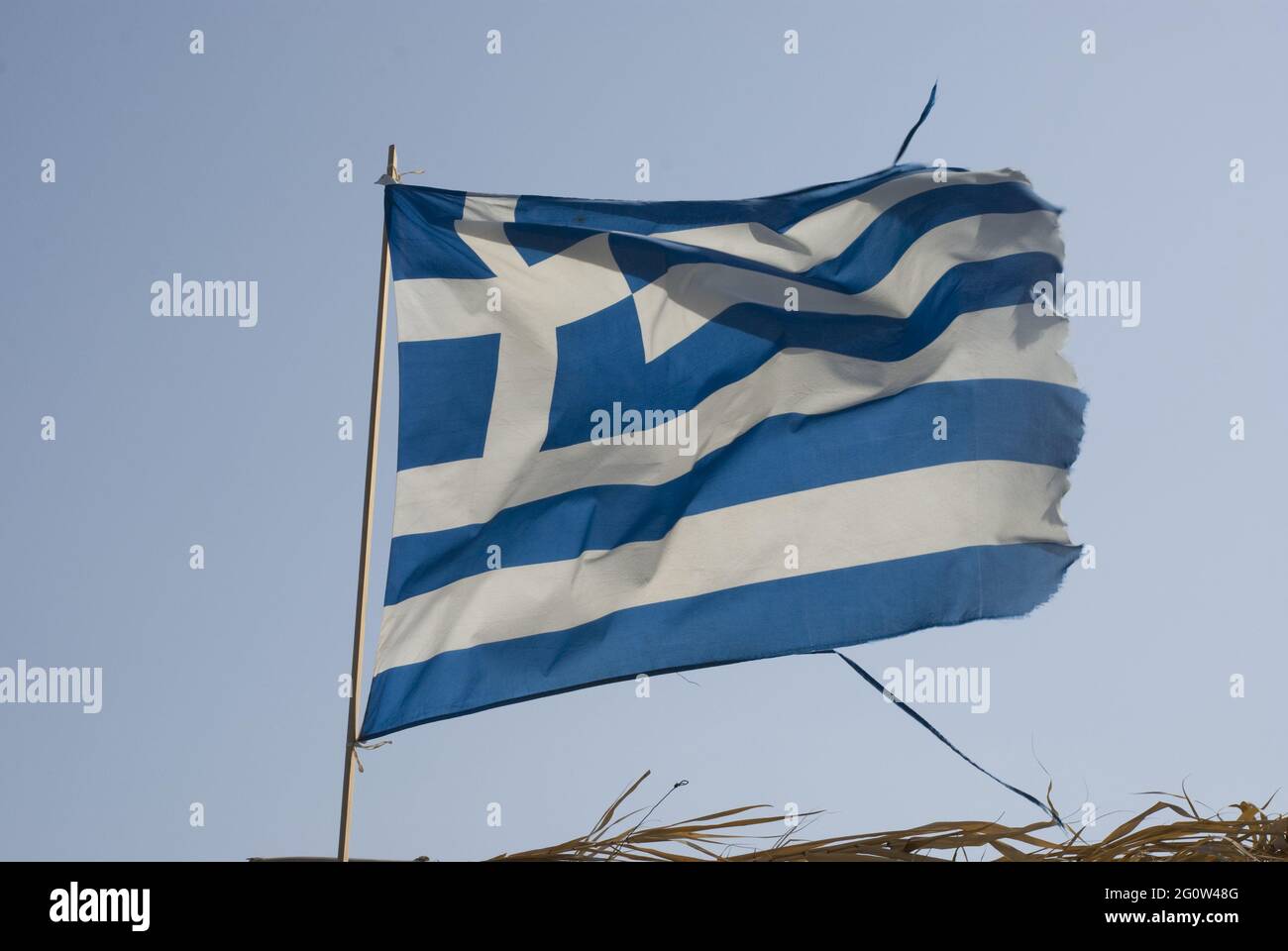 Greek flag on a pole Stock Photo - Alamy